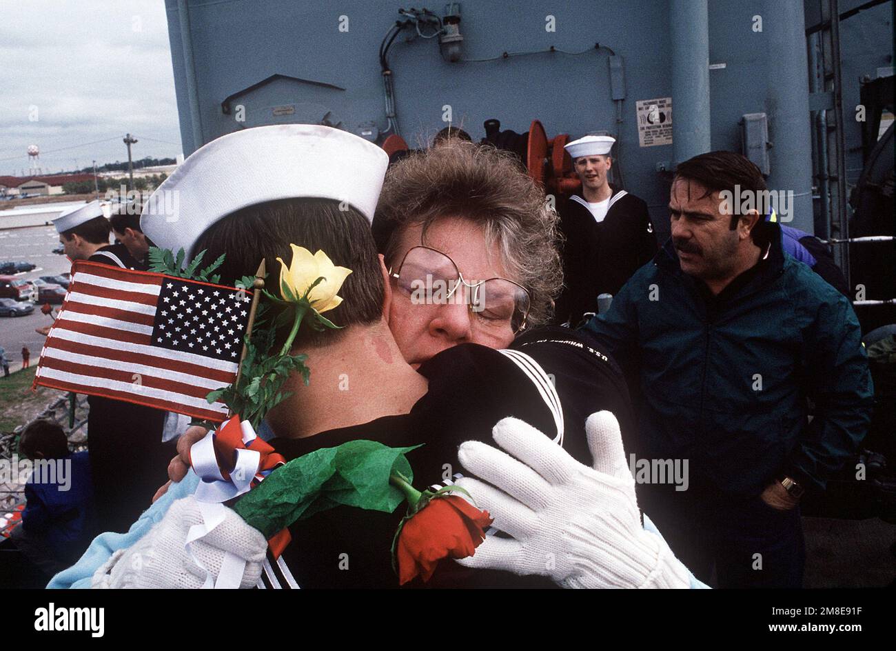 A sailor assigned to the dock landing ship USS WHIDBEY ISLAND (LSD-41 ...