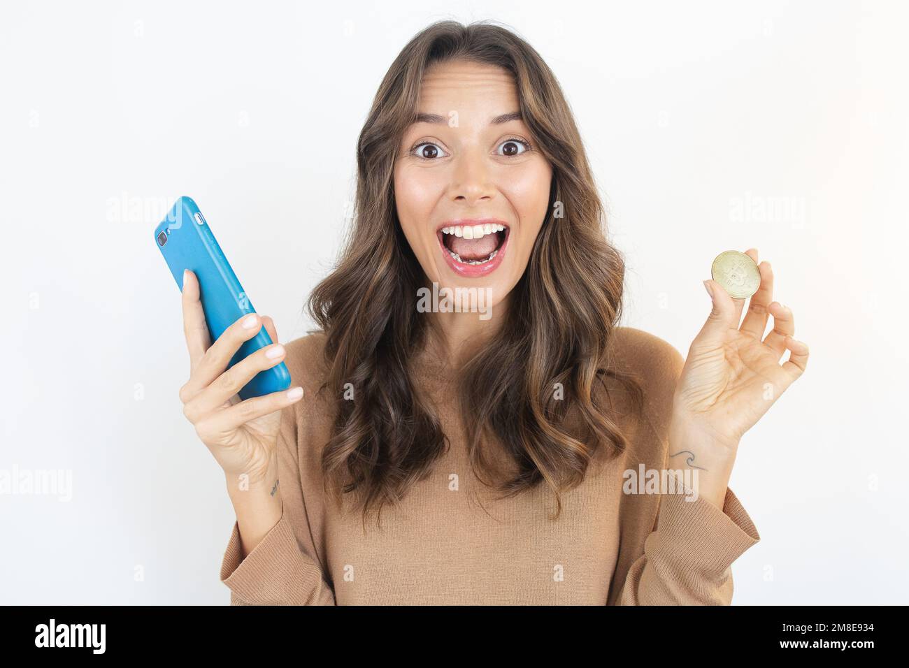 Earn Crypto Online Happy Woman Holding Smartphone and Bitcoin Stock ...