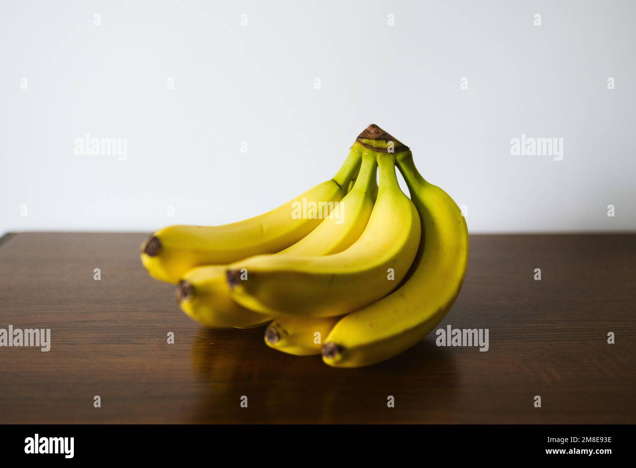 Close up banana on table with white background Stock Photo - Alamy