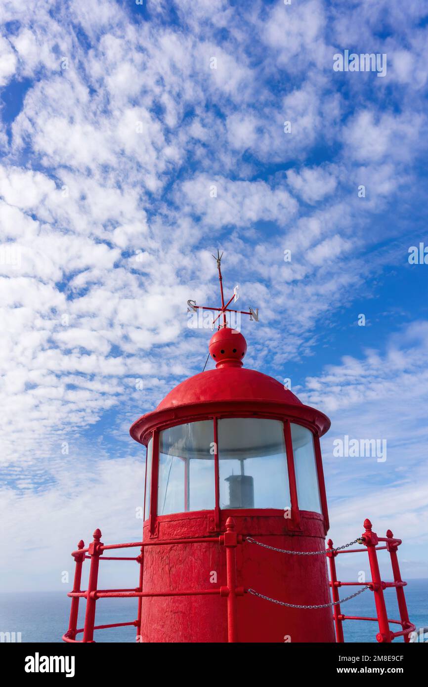 Bright red lighthouse in Nazare Stock Photo - Alamy