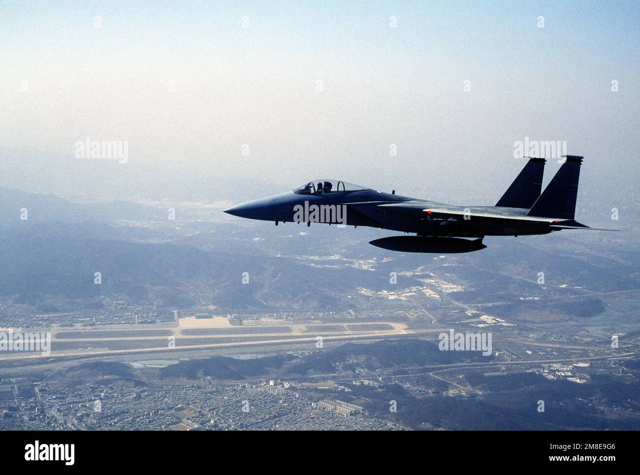 An F-15A Eagle aircraft from 18th Tactical Fighter Wing arrives over ...