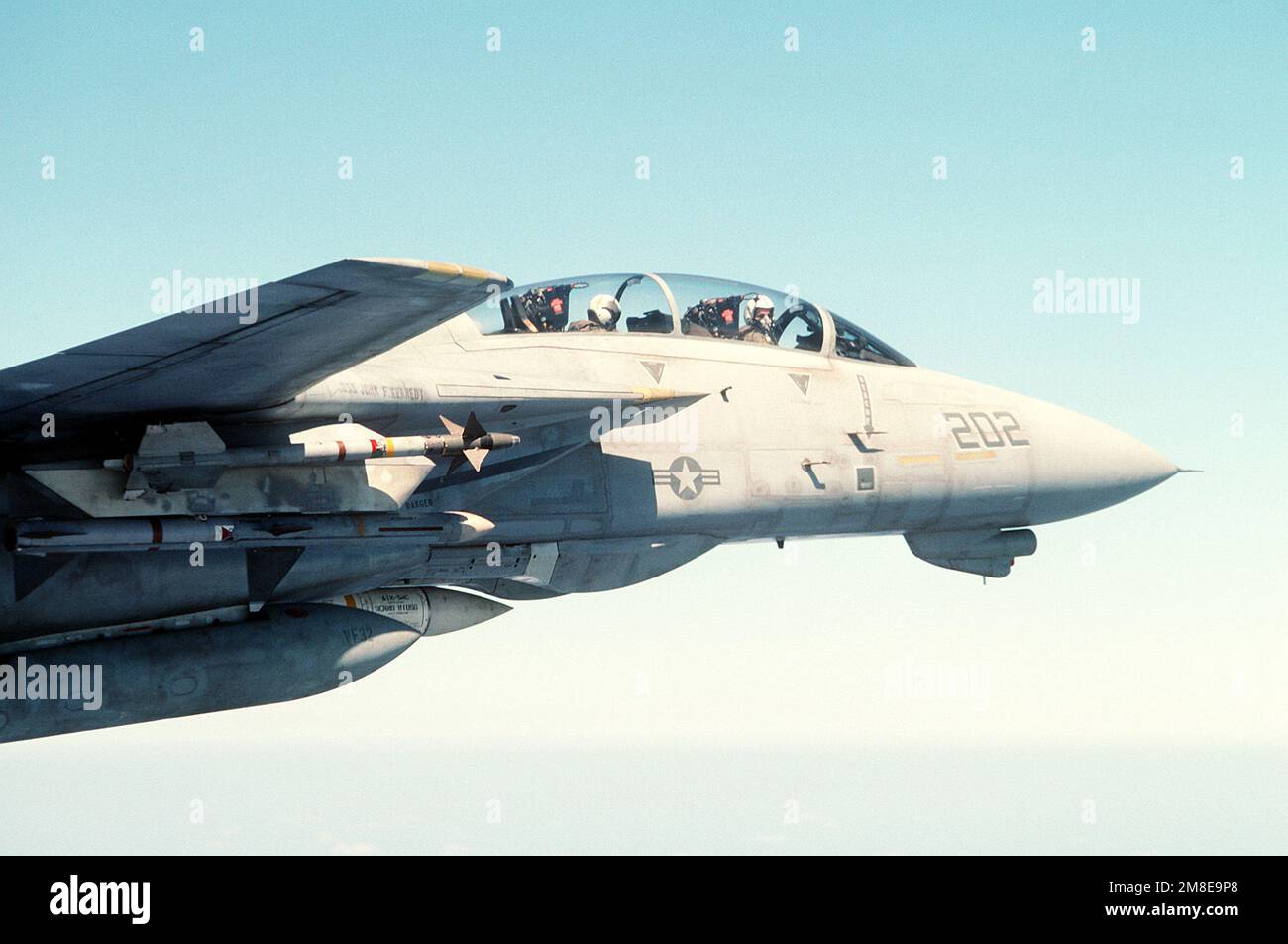A Fighter Squadron 32 (VF-32) F-14A Tomcat aircraft flies a patrol off ...