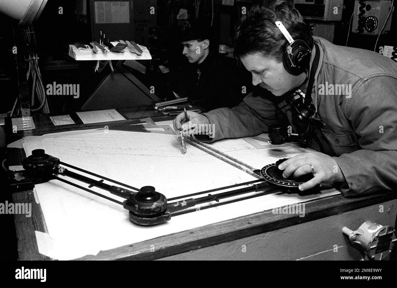 Operations SPECIALIST 1ST Class (SW) William Tanner plots mine ...