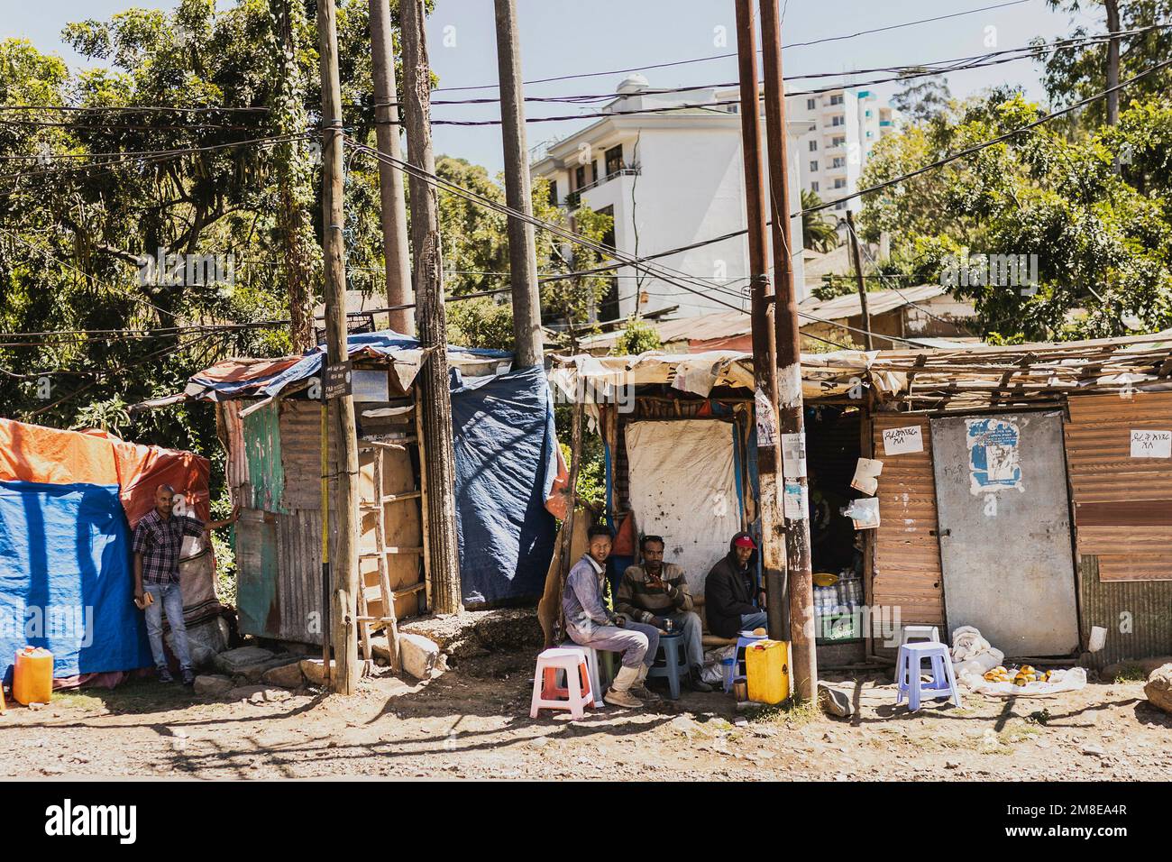 Small huts and shops at the roadside, photo taken in Addis Ababa ...