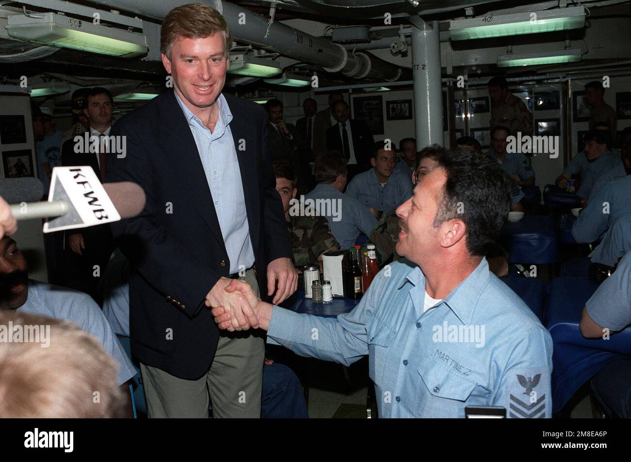Vice President J. Danforth Quayle meets crew members aboard the ...