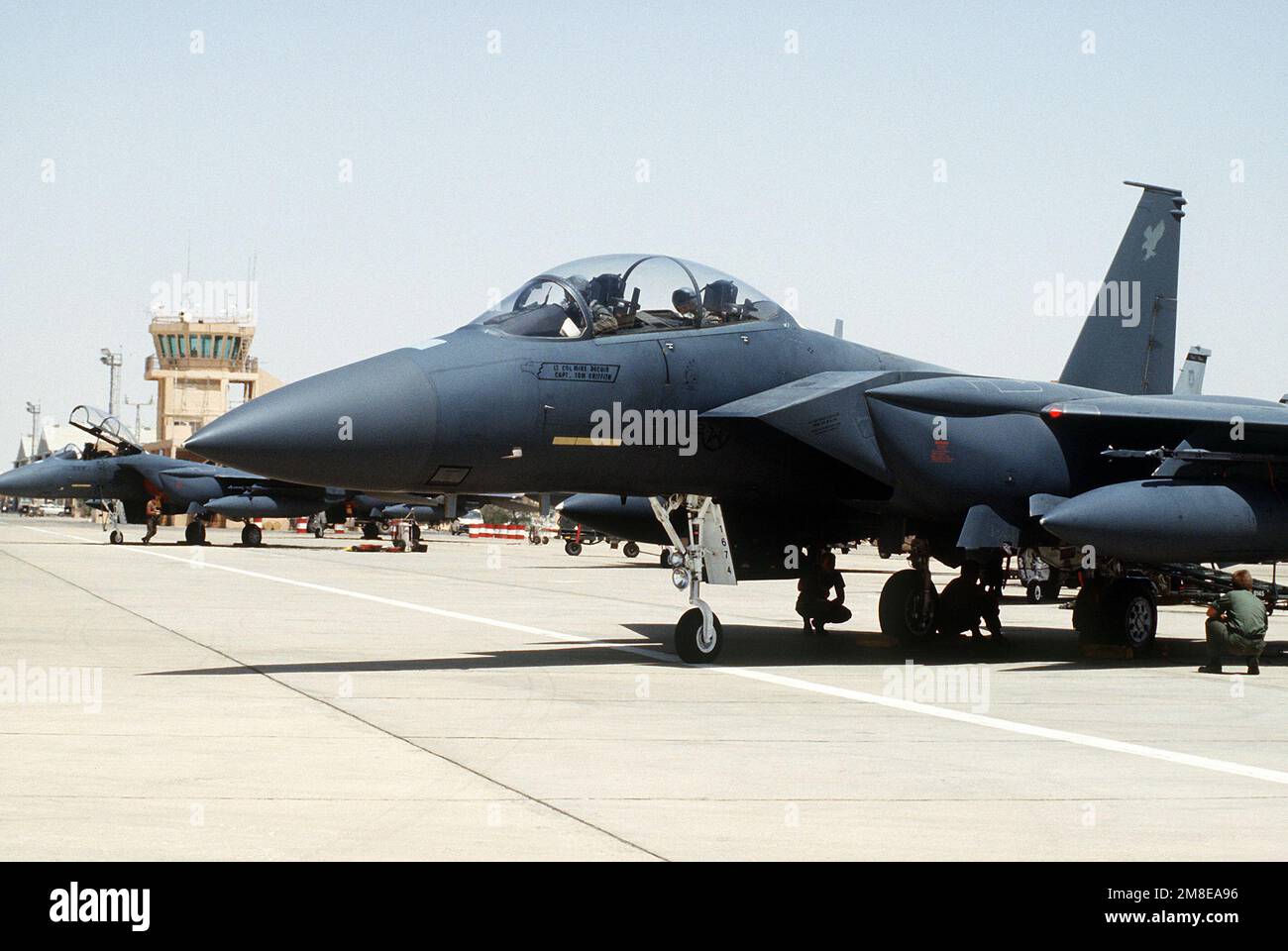 A 336th Tactical Fighter Squadron F-15E Eagle aircraft is readied for ...
