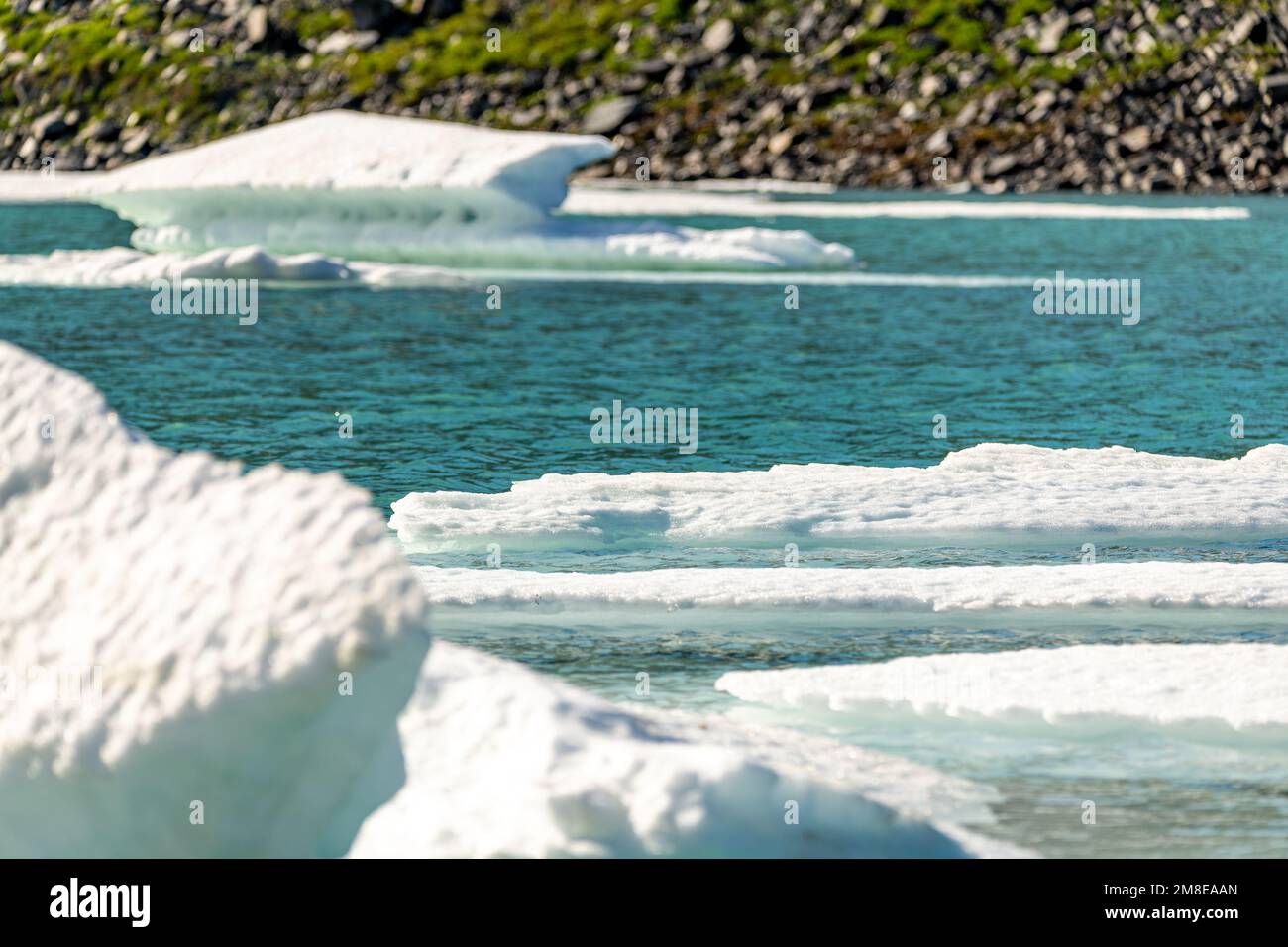 Glacial lake with large ice chunks seen in northern Canada during ...