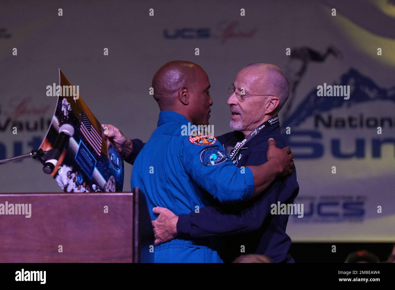US Navy Captain and NASA astronaut Victor Glover (left) embraces coach ...
