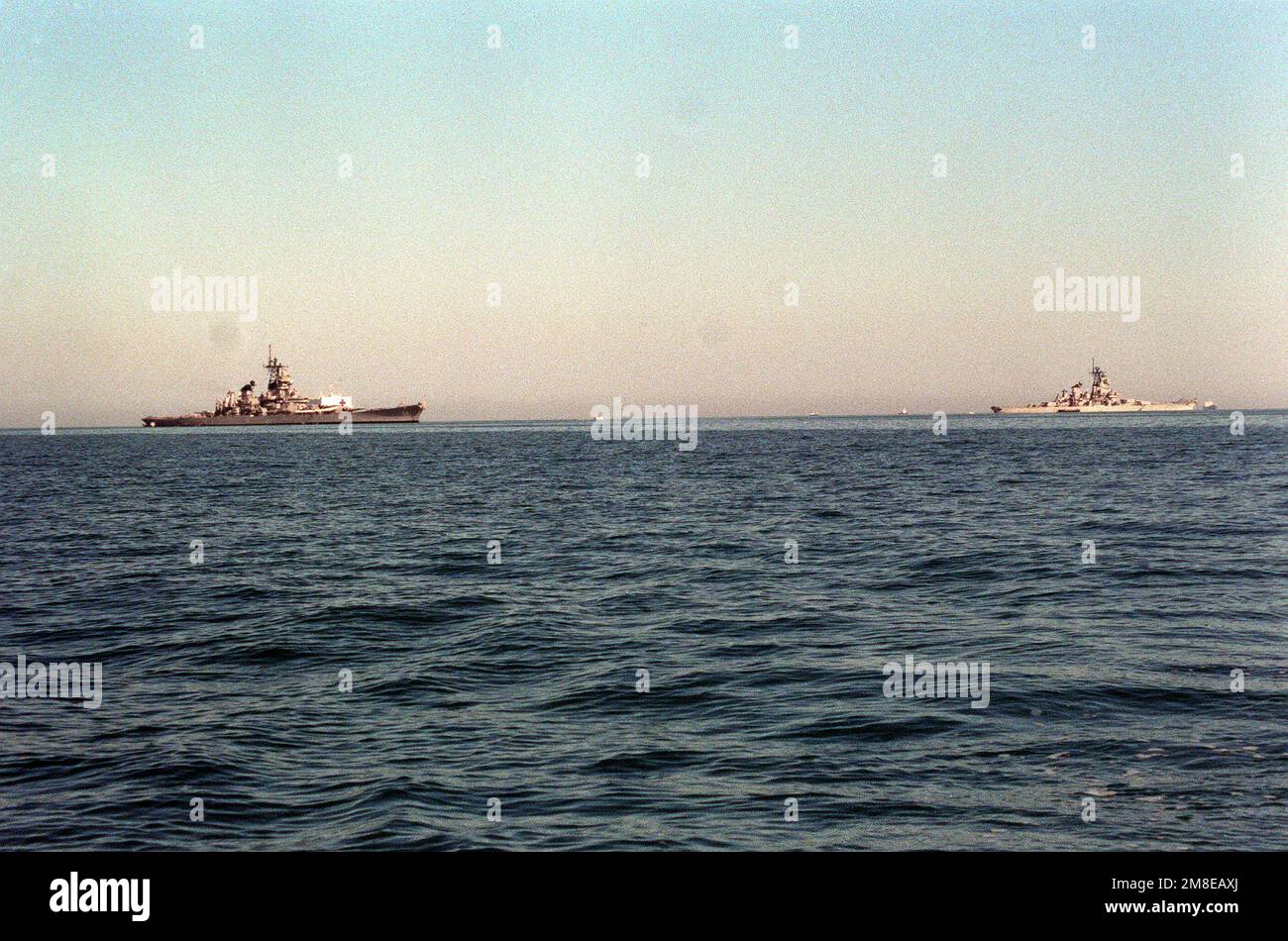 The battleships USS WISCONSIN (BB-64), left, and USS MISSOURI (BB-63 ...