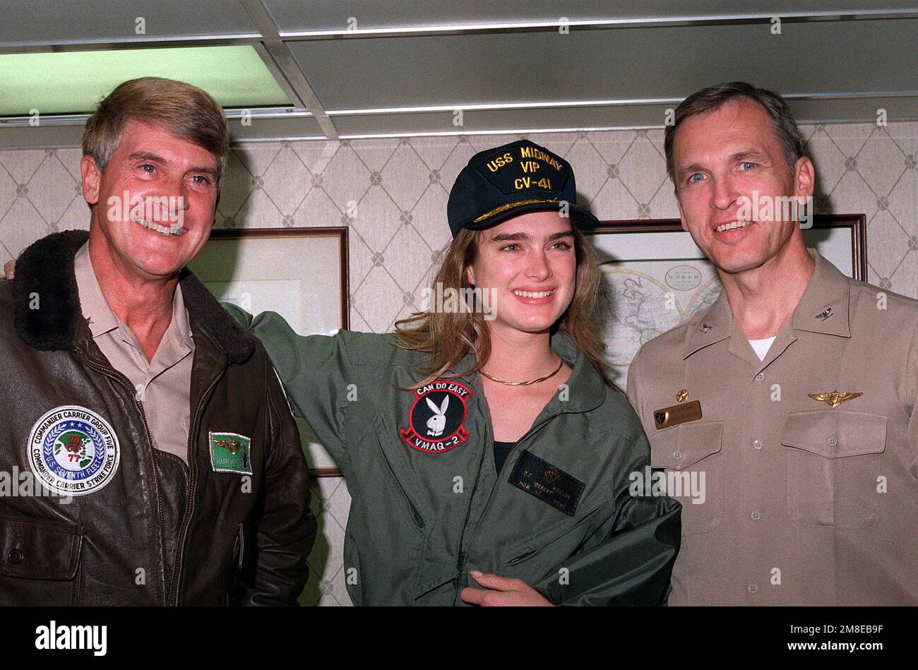 Actress Brooke Shields is flanked by Rear Adm. Daniel P. March, left ...