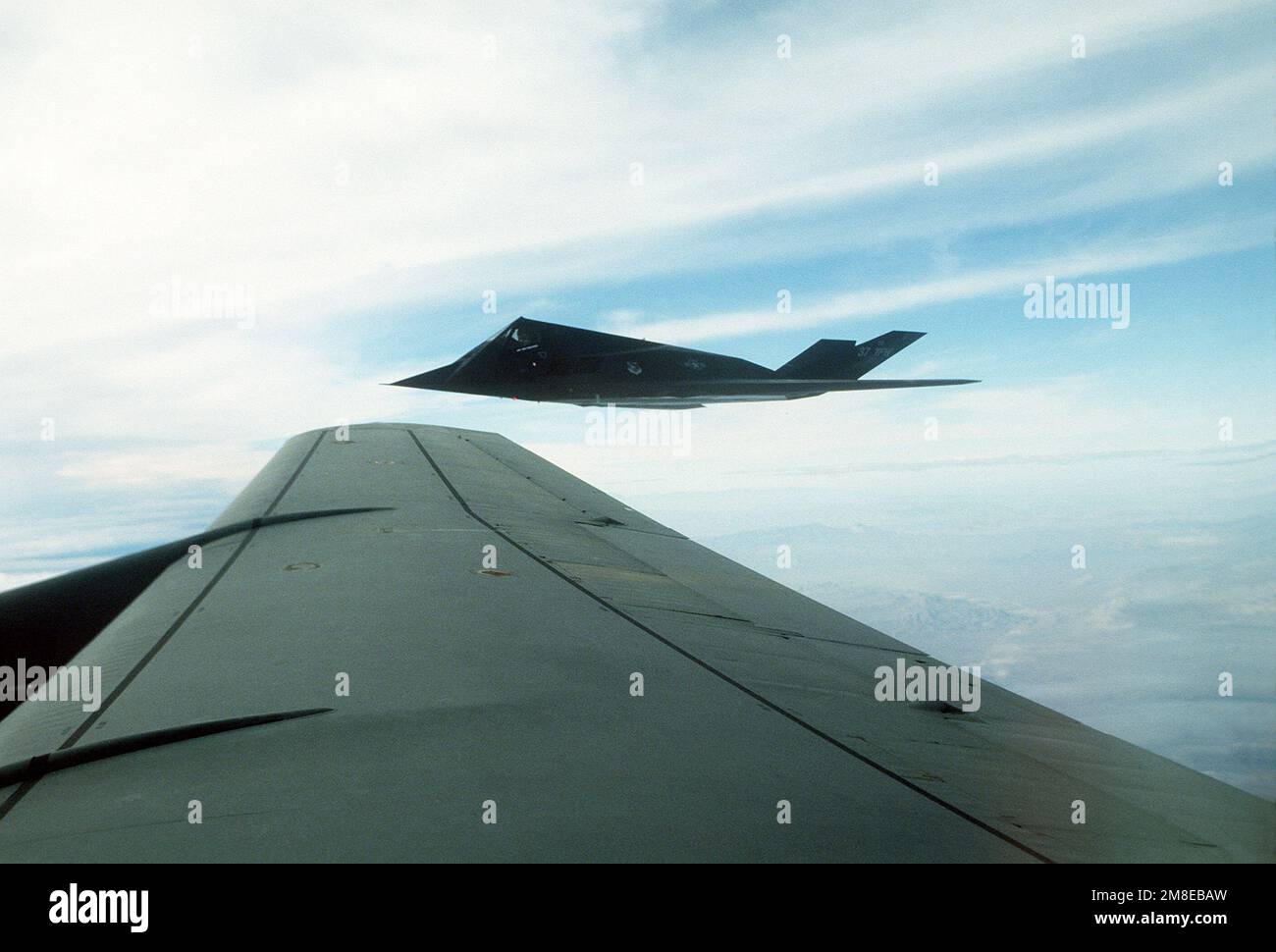 A 37th Tactical Fighter Wing (37th TFW) F-117A aircraft flies off the ...