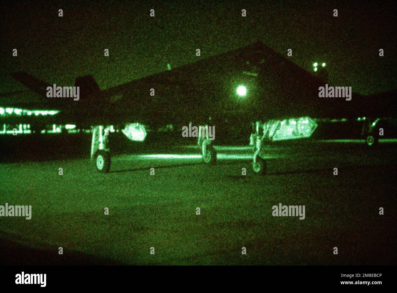 As seen through a night vision lens, an F-117A aircraft from the 37th ...