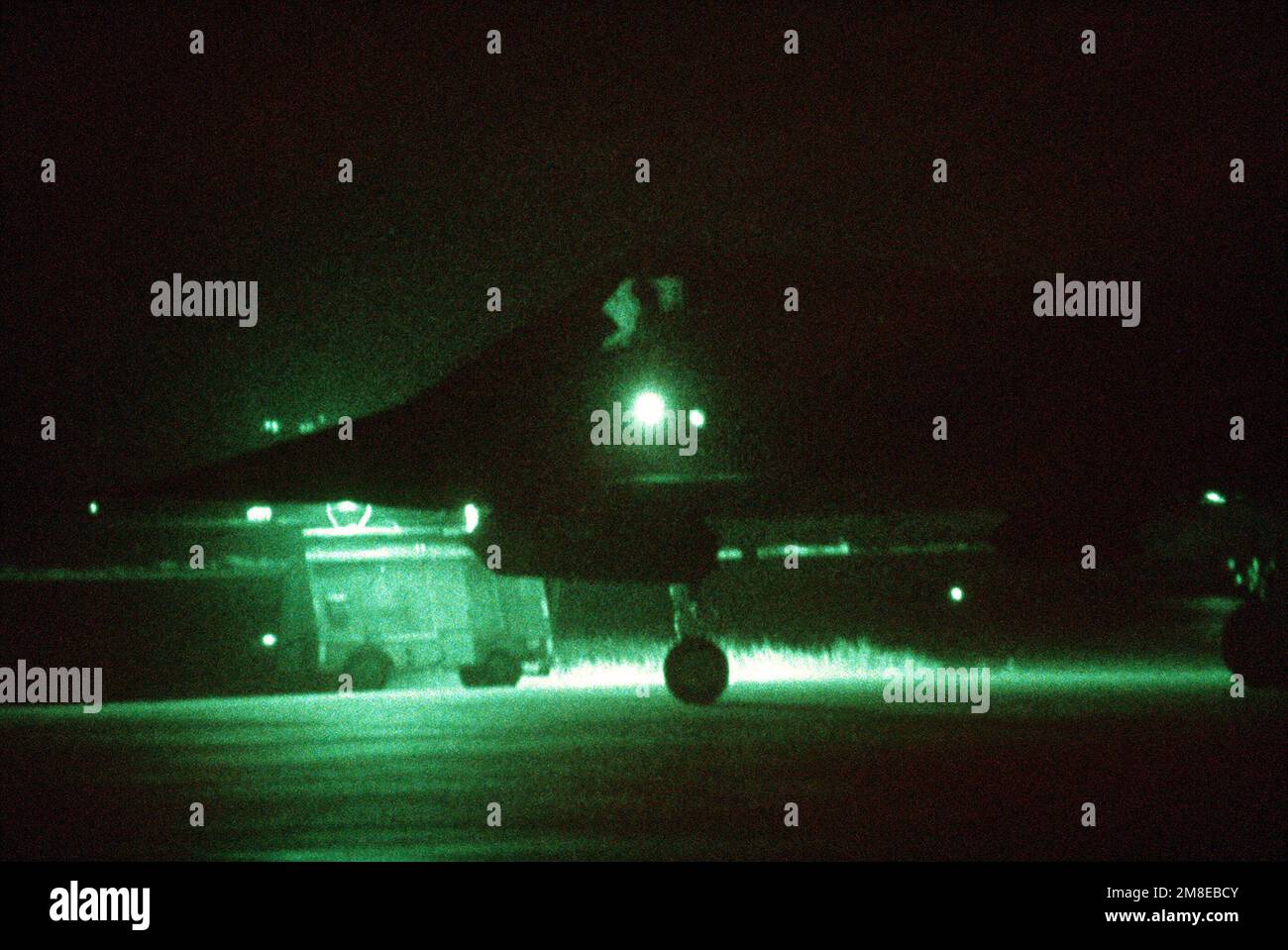 As seen through a night vision lens, an F-117A aircraft from the 37th ...