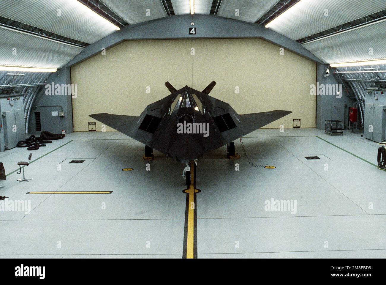 An F-117A aircraft from the 37th Tactical Fighter Wing (37th TFW) sits ...