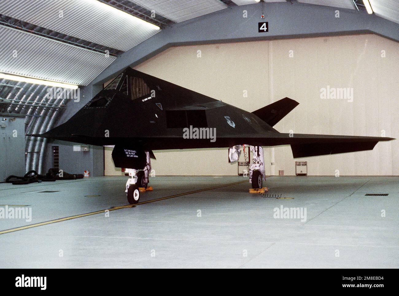 An F-117A aircraft from the 37th Tactical Fighter Wing (37th TFW) sits ...