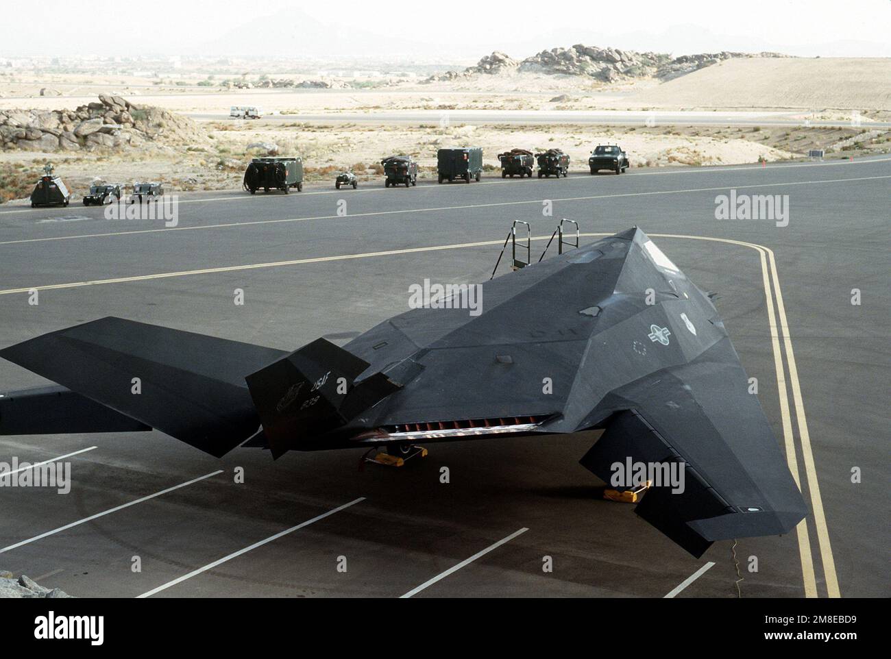 A 37th Tactical Fighter Wing (37th TFW) F-117A aircraft sits parked ...