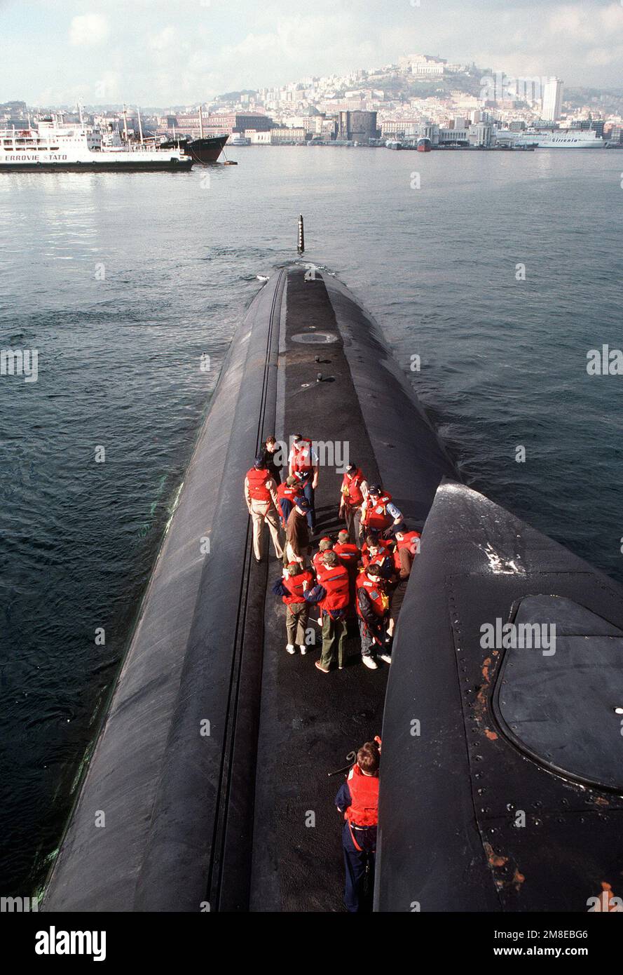 Members of Boy Scout Troop 85 assemble with crew members on the deck of ...