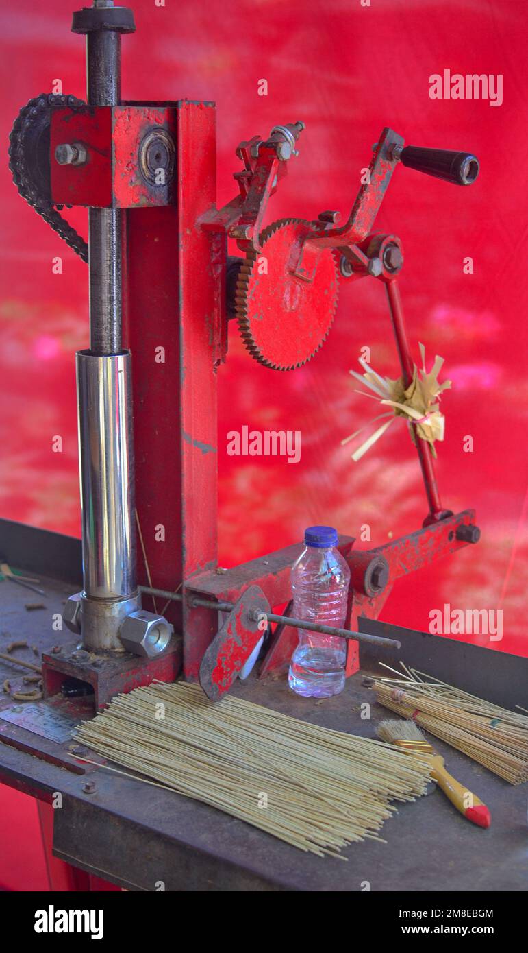 mechanical machine for making aroma sticks Stock Photo - Alamy