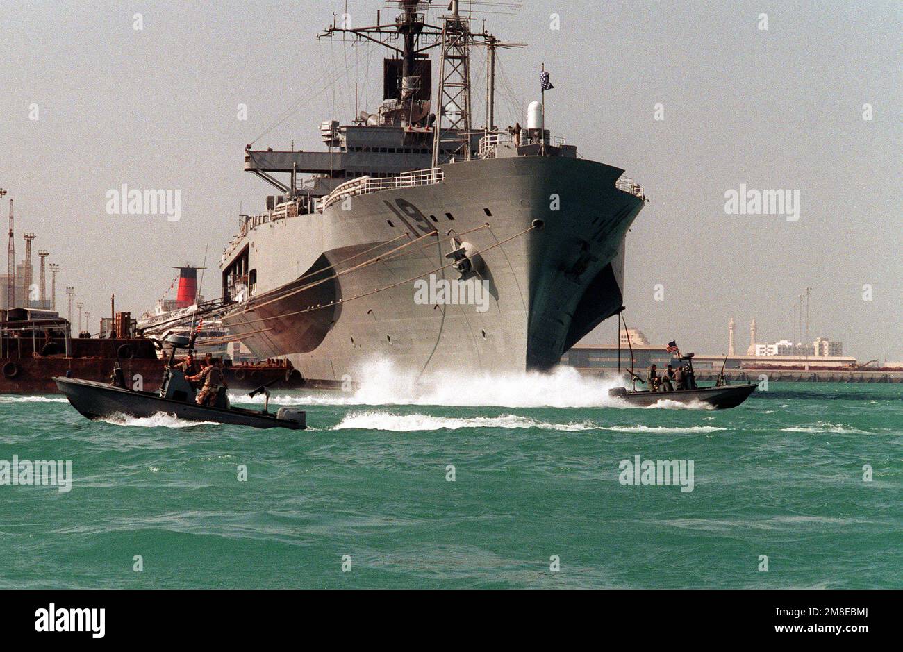 Two Coast Guard Sea Raider utility craft carrying security personnel ...