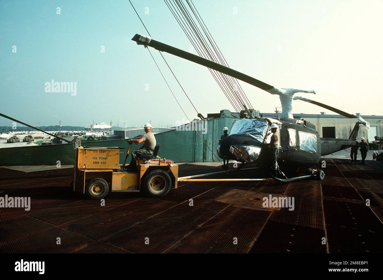 A member of the 1181st Transportation Terminal Unit tows a 101st Combat ...