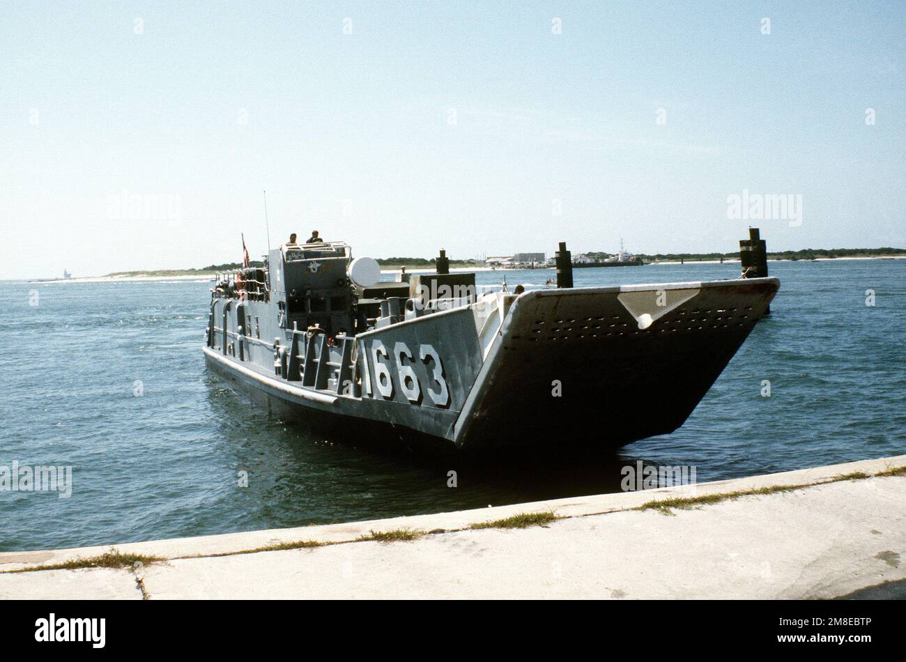 The utility landing craft LCU-1663 backs away from the landing after ...