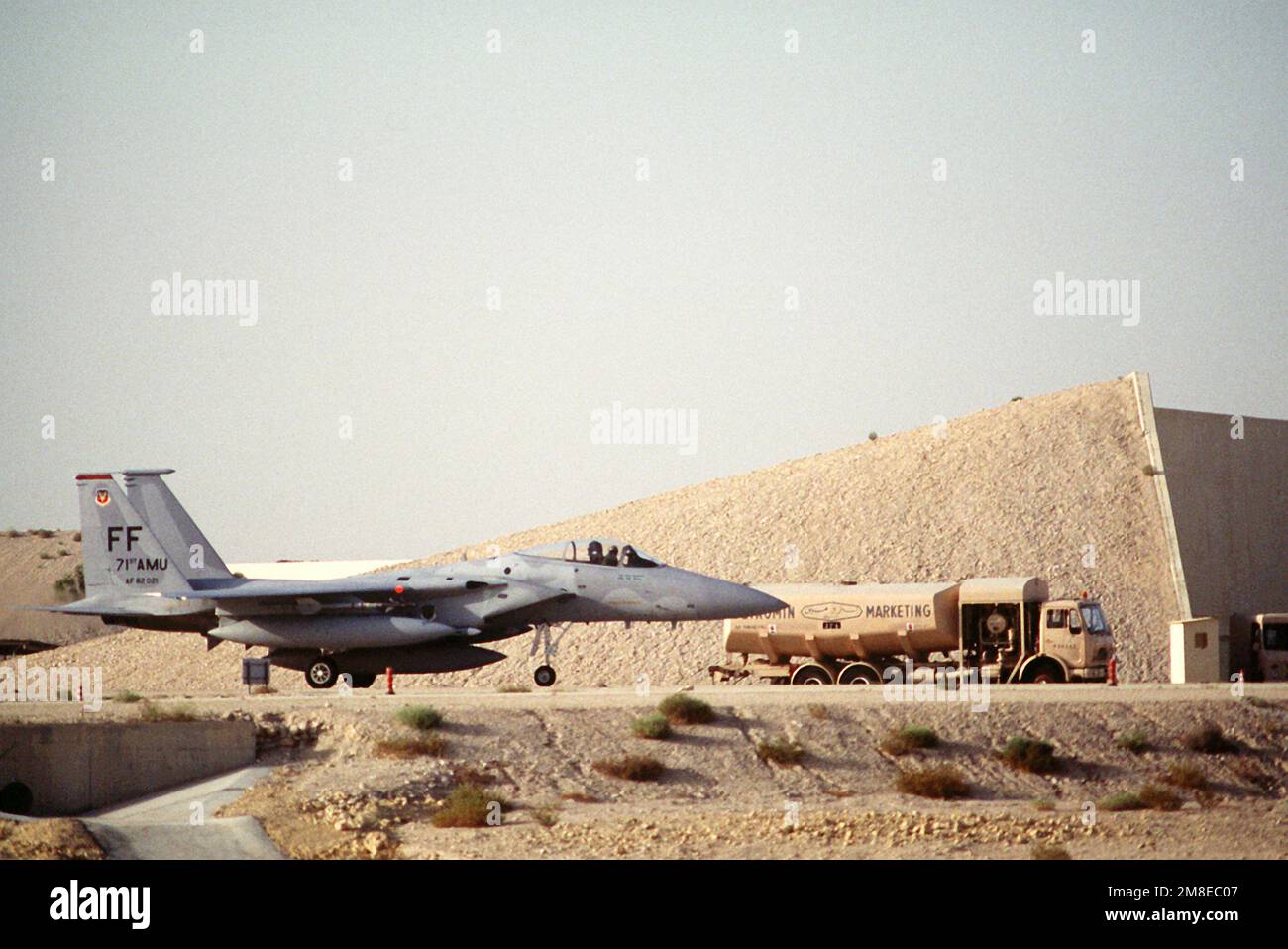 A 1ST Tactical Fighter Wing F-15C Eagle aircraft taxis toward its ...