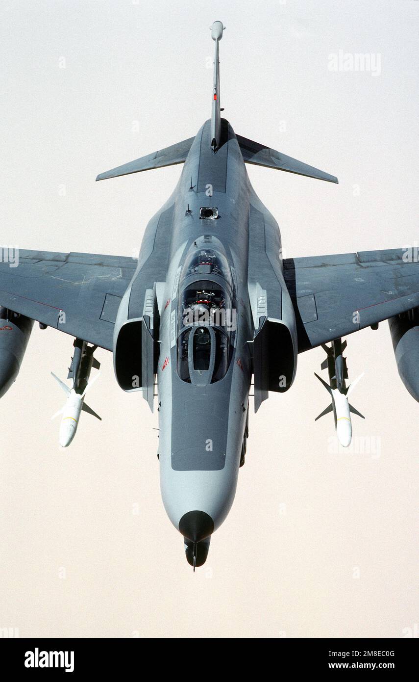 A 35th Tactical Fighter Wing F-4G Phantom II aircraft passes over the ...