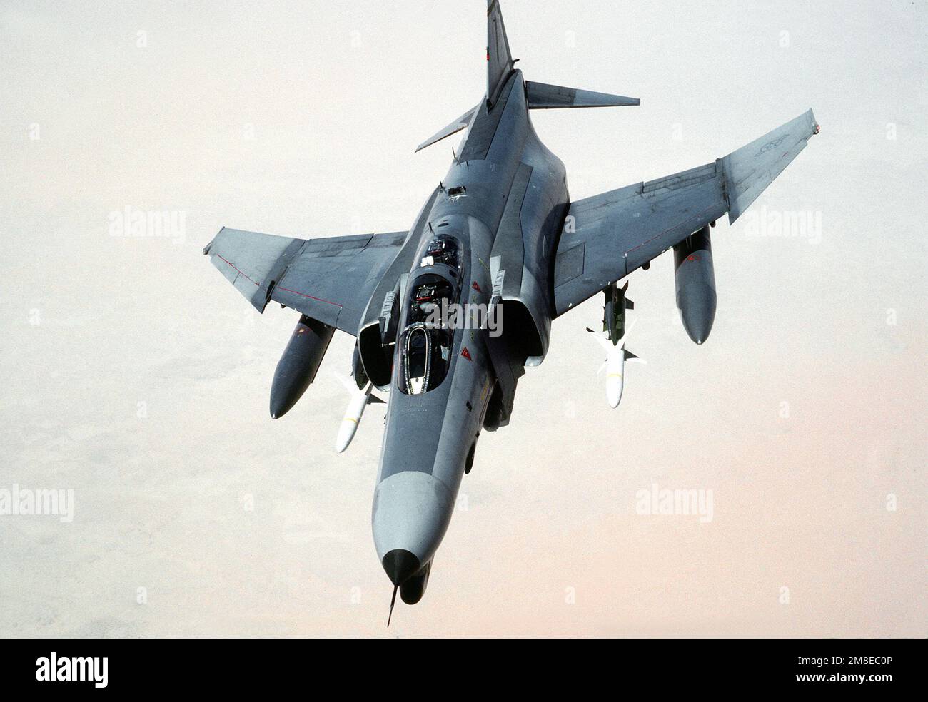 A 35th Tactical Fighter Wing F-4G Phantom II aircraft banks to the ...