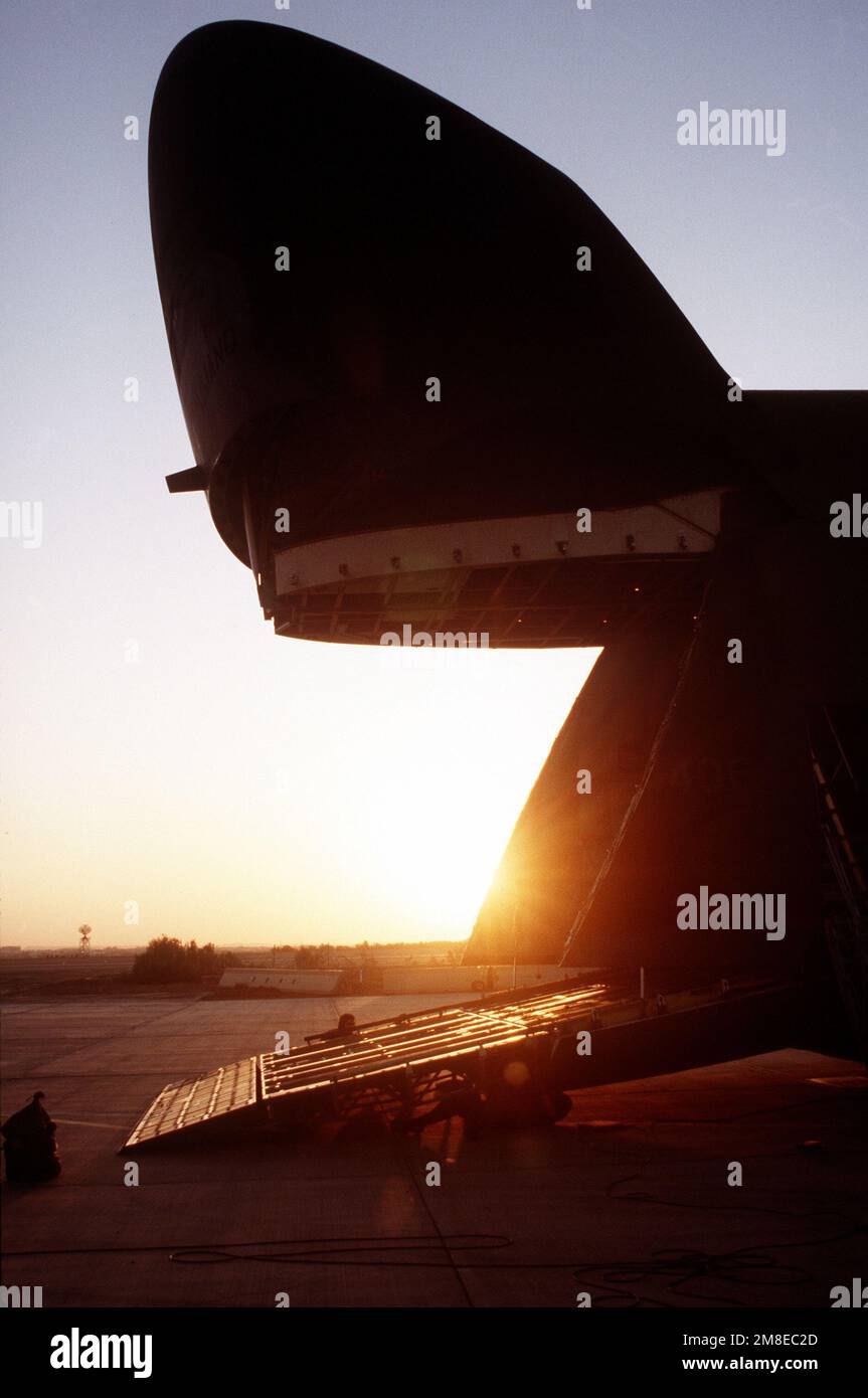 The nose ramp of a Military Airlift Command C-5A Galaxy aircraft is ...