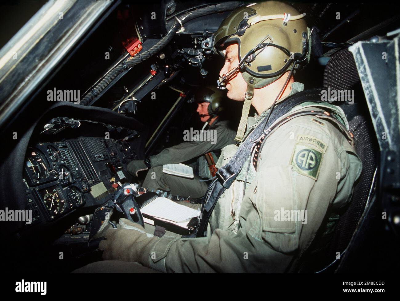 A pilot and co-pilot of a UH-60 Black Hawk (Blackhawk) helicopter run ...