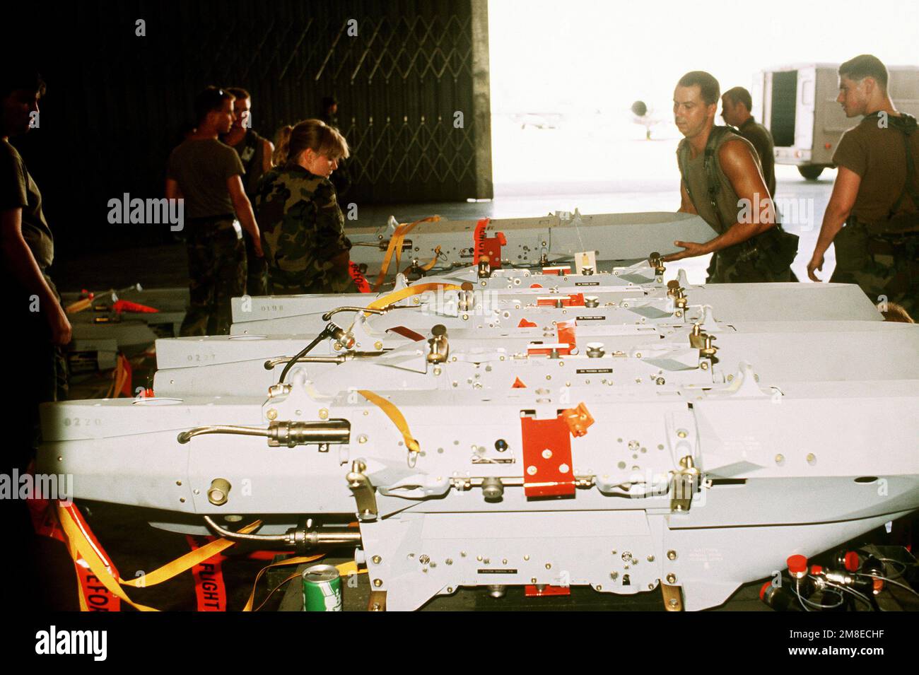 Personnel from the 388th Equipment Maintenance Squadron load TER-9A ...