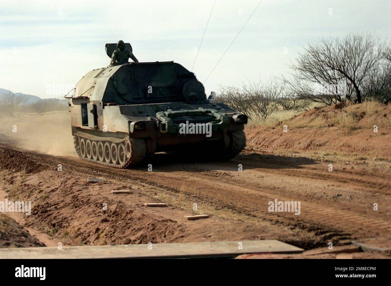 An M-992 field artillery ammunition support vehicle (FAASV) is driven ...