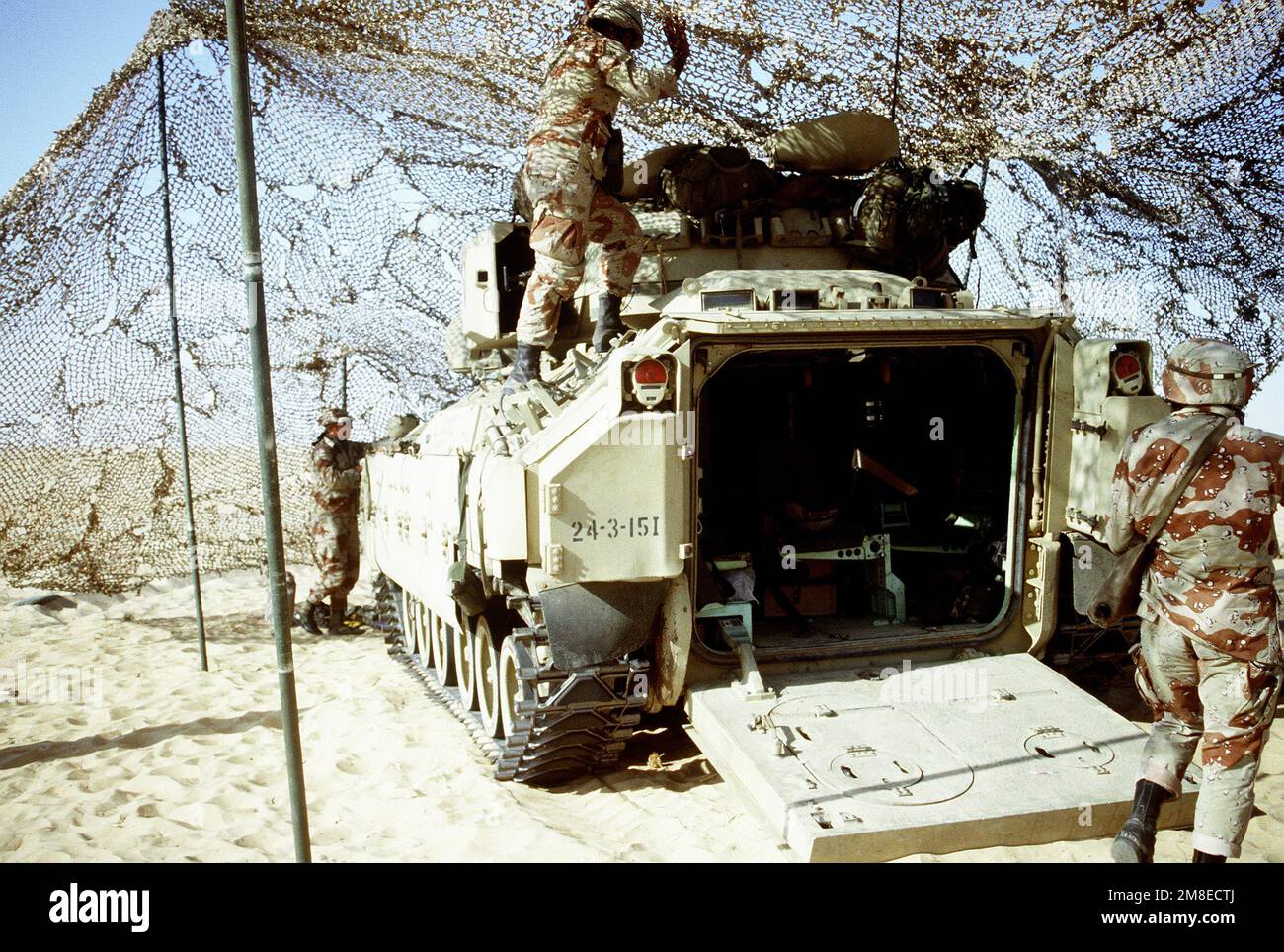 The crew of the 24th Infantry Division (Mechanized) M-2 Bradley ...