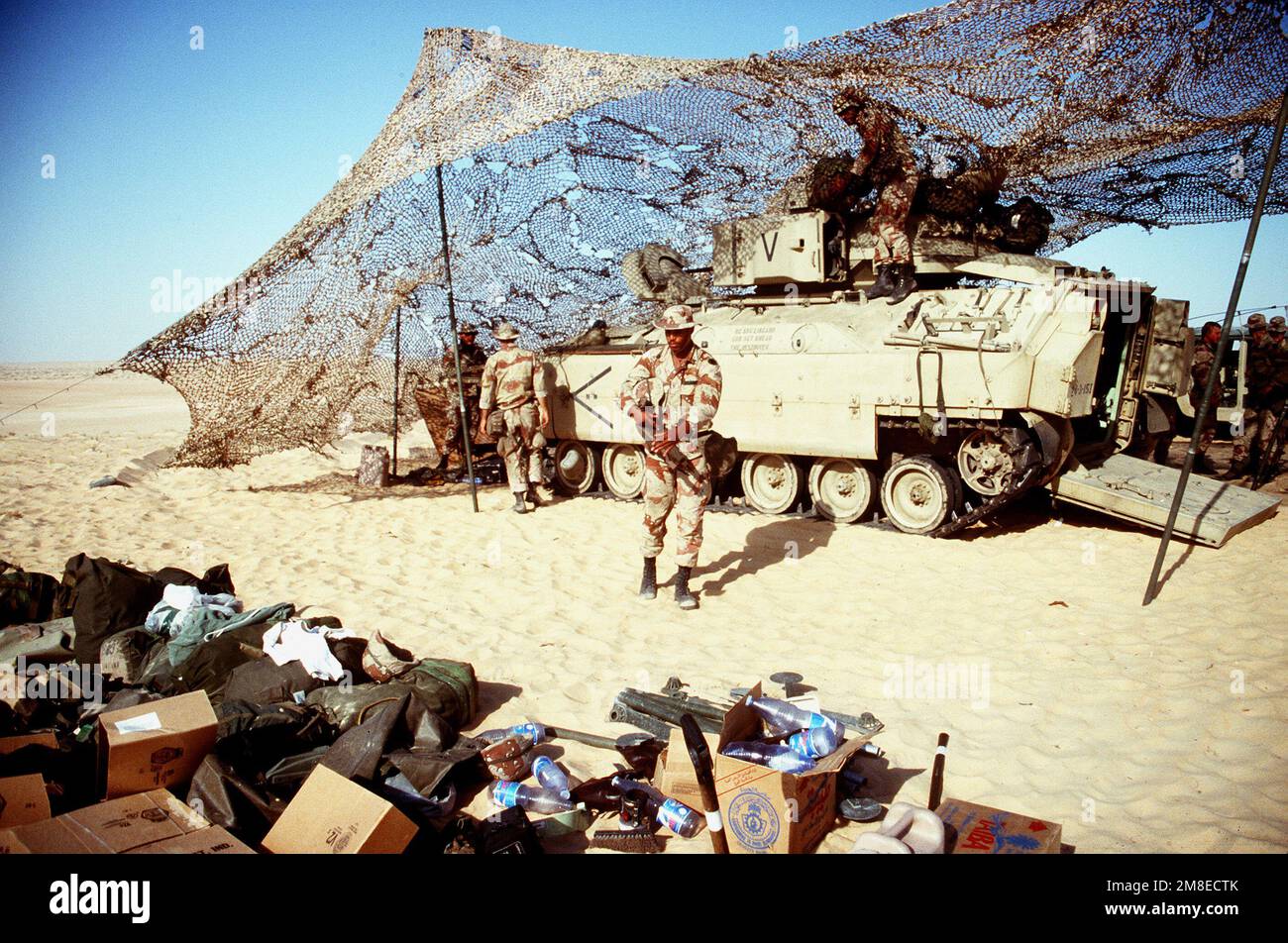 The crew of the 24th Infantry Division (Mechanized) M-2 Bradley ...