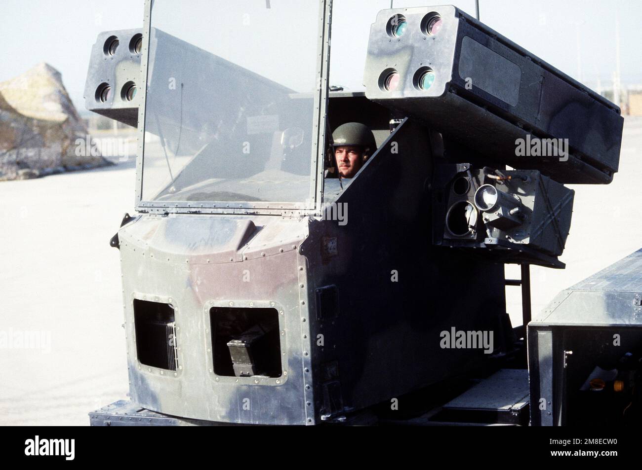 A soldier from Btry. A, 2nd Bn., 6th Air Defense Artillery Bde., sits ...