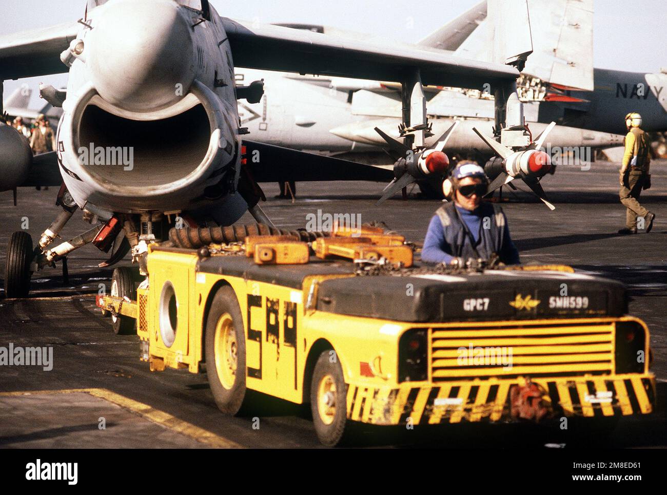 A flight deck crew member aboard the aircraft carrier USS JOHN F ...