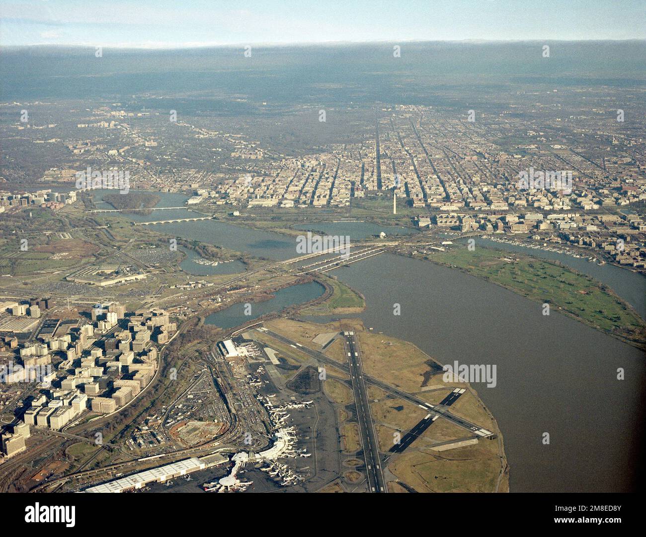 An aerial view of the Potomac River with a section of National Airport ...