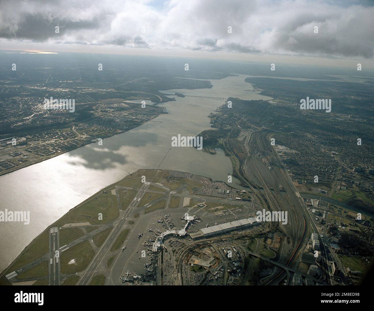 An aerial view of the Potomac River with a section of National Airport ...