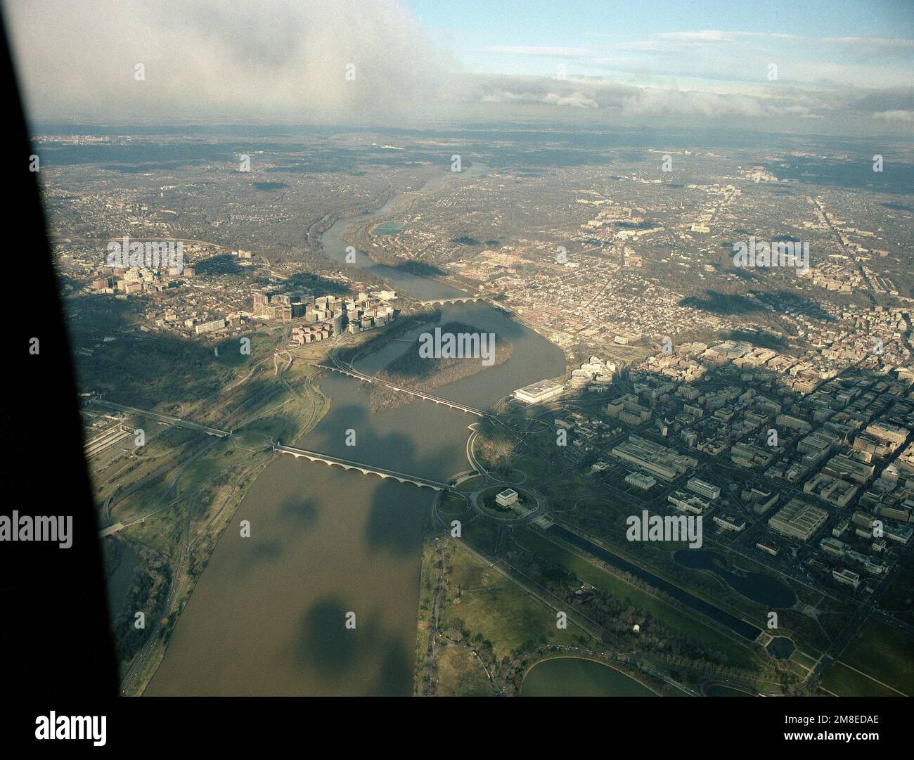An aerial view of the Potomac River with the Arlington Memorial Bridge ...