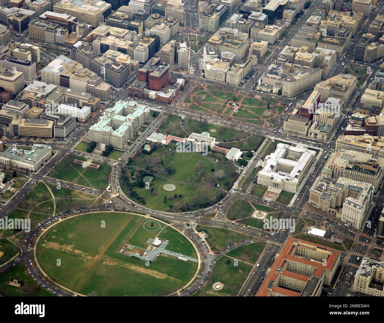 An aerial view of the White House, flanked by the Old Executive Office ...