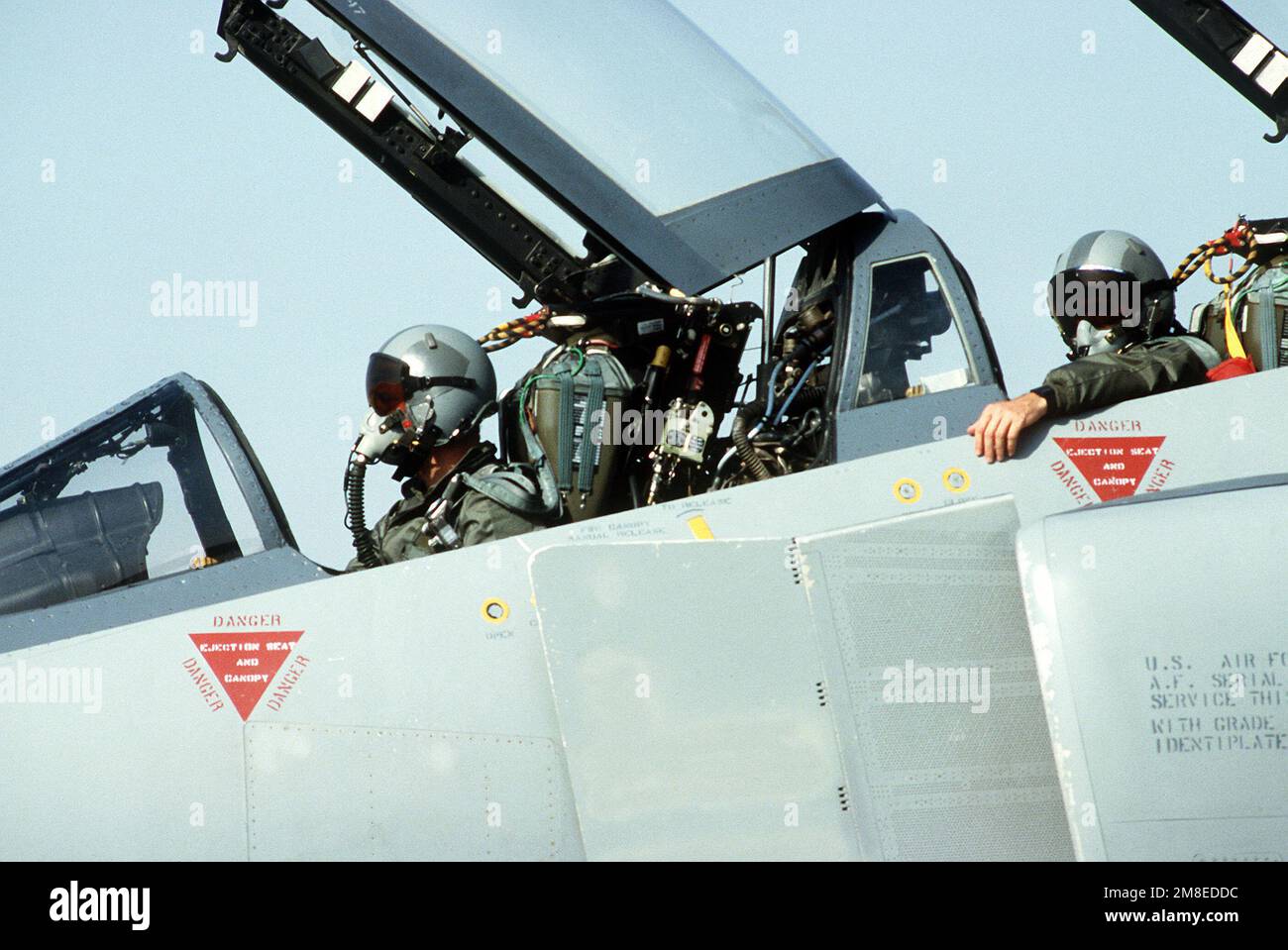 The aircrew of an RF-4C Phantom II reconnaissance aircraft goes through ...