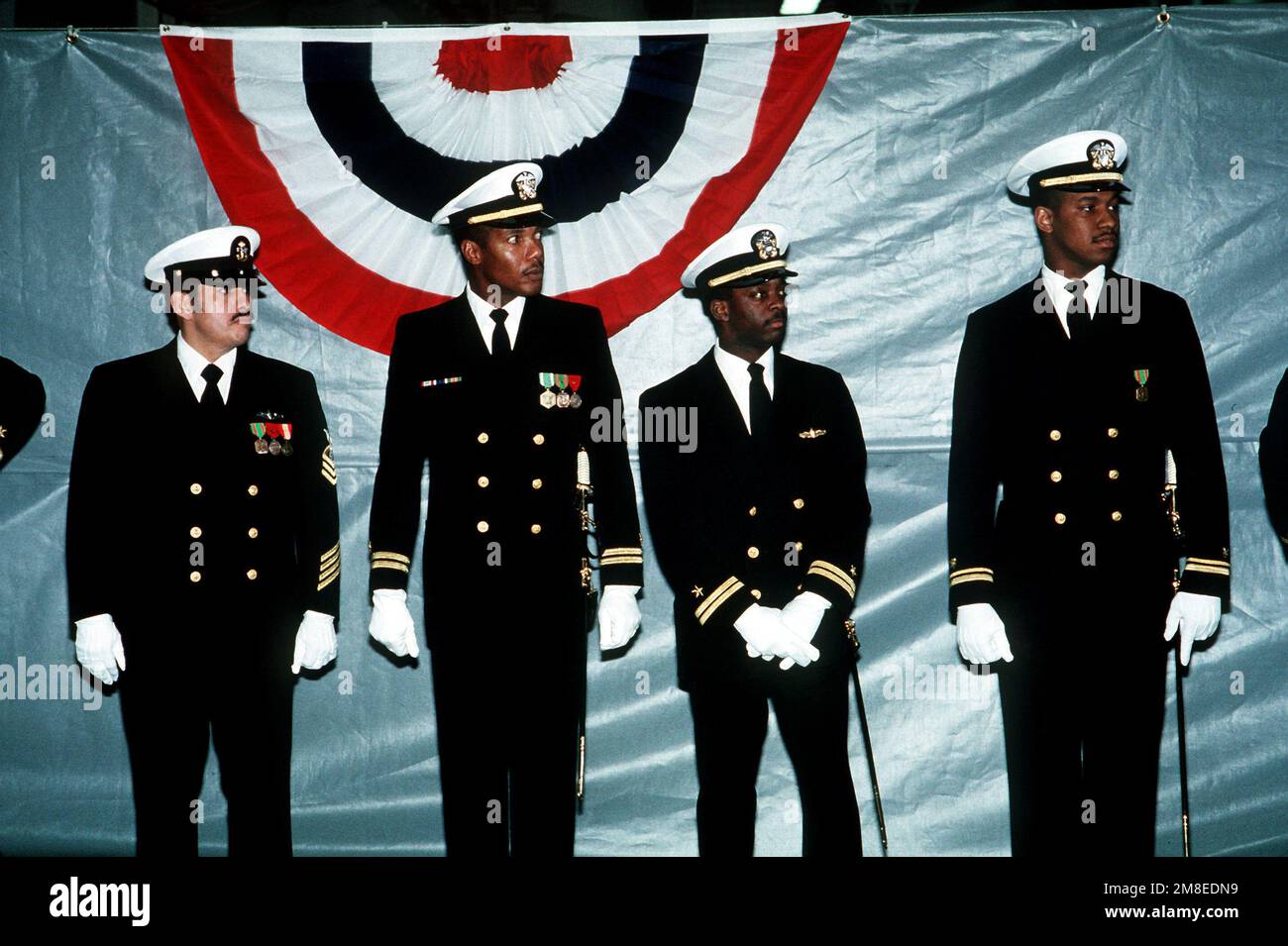 Officers stand by during the change of command ceremony at which VADM ...