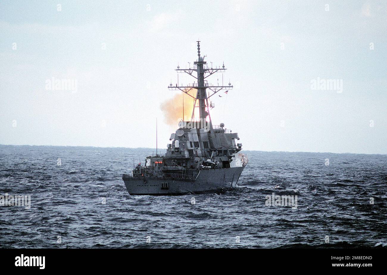 A RIM-66C Standard SM-2 MR missile is fired from a cell in the forward ...