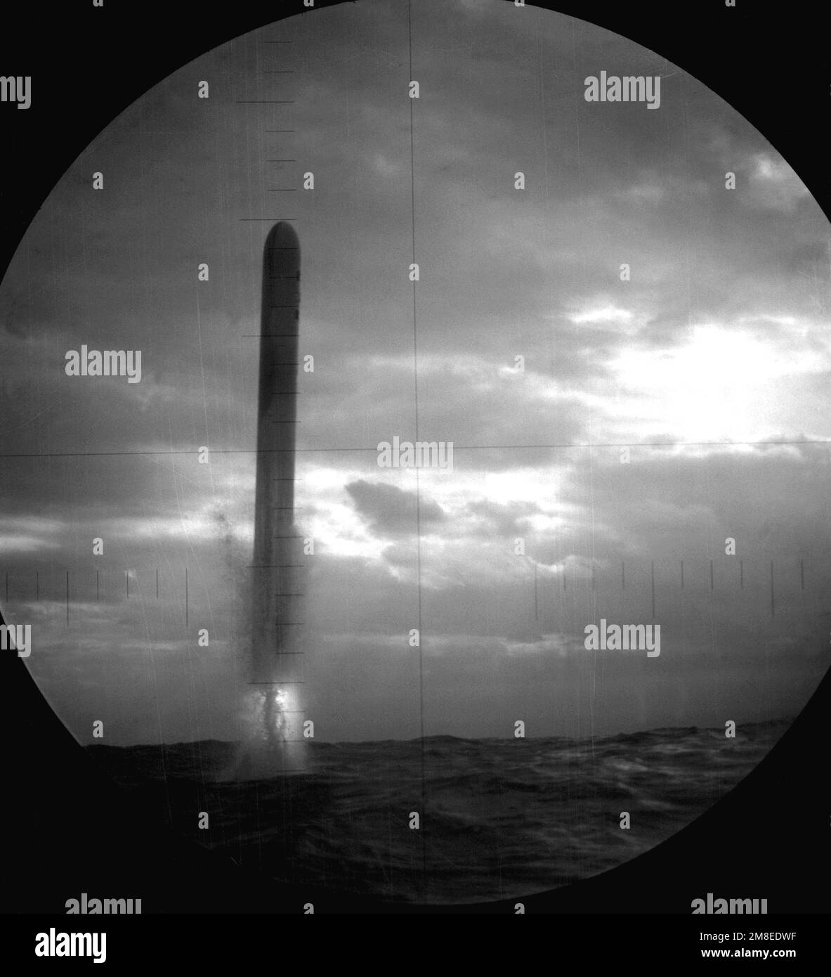 As seen through the submarine's periscope, a BGM-109 Tomahawk Land ...