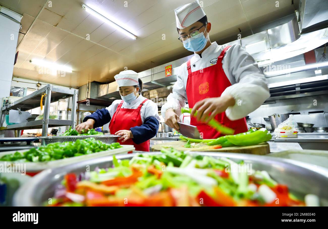 ZHANGYE, CHINA - JANUARY 13, 2023 - Chefs prepare Lunar New Year's Eve ...