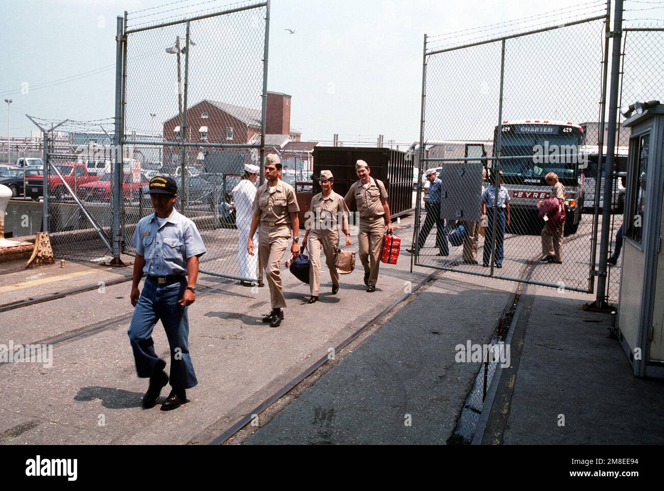 U.S. Navy personnel prepare to board the hospital ship USS COMFORT (T ...