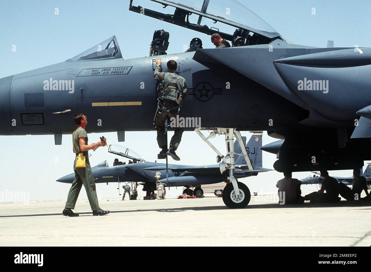 LT. COL. Bob Gruver, 334th Tactical Fighter Squadron, climbs into his F ...
