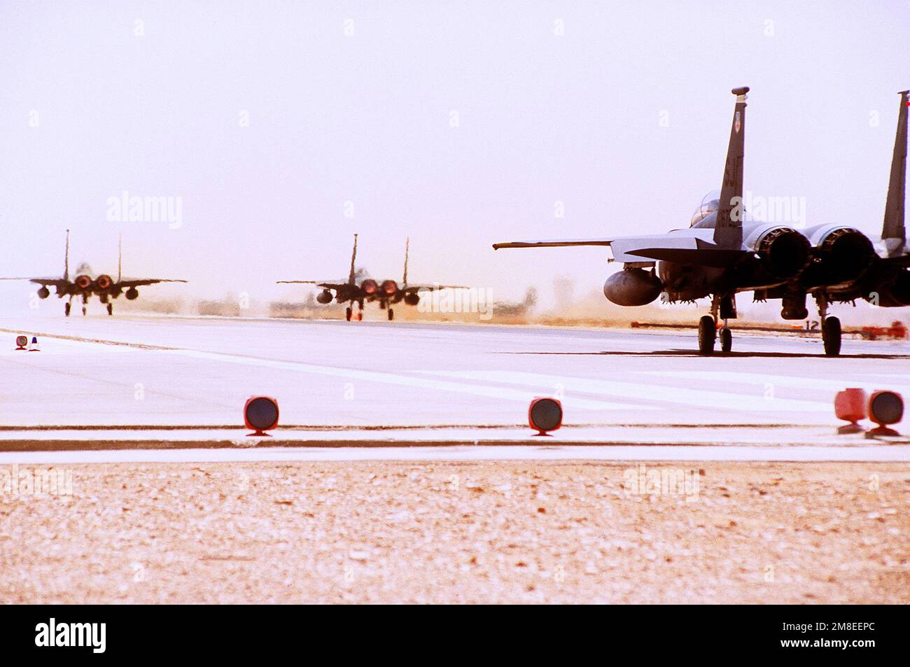 F-15E Eagle aircraft of the 336th Tactical Fighter Wing are enveloped ...