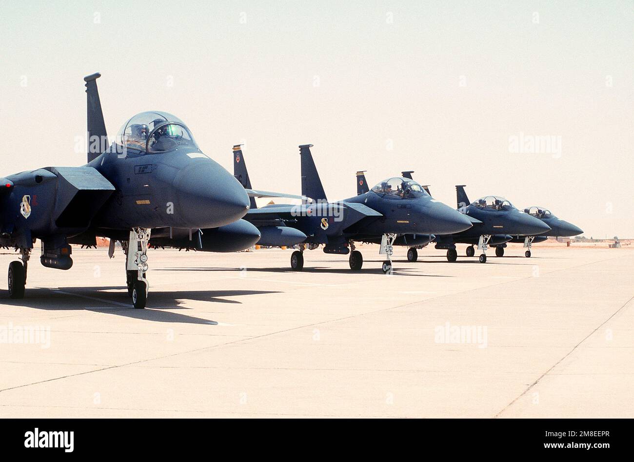 F-15E Eagle aircraft of the 336th Tactical Fighter Squadron prepare to ...