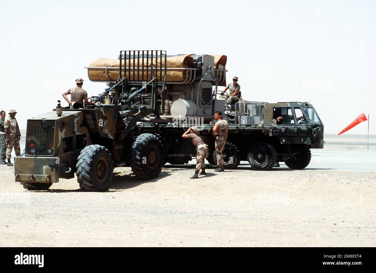 STAFF SGT. John S. Butler, 4th Mobile Aerial Port Squadron, uses a ...